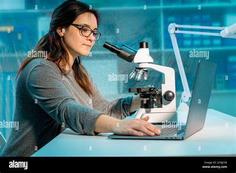 Babe Using Microscope Stock Photo Alamy