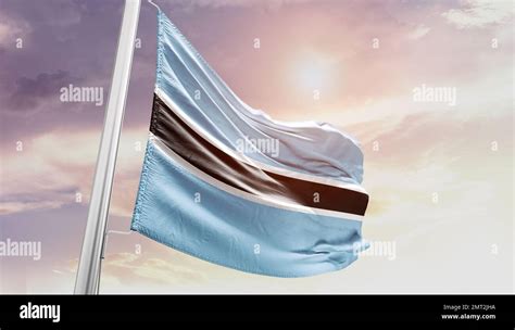 Botswana Waving Flag In Beautiful Sky Stock Photo Alamy