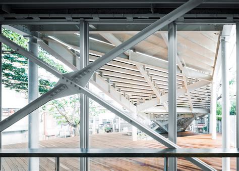 Kengo Kuma Uses A Grand Staircase To Create A Shop
