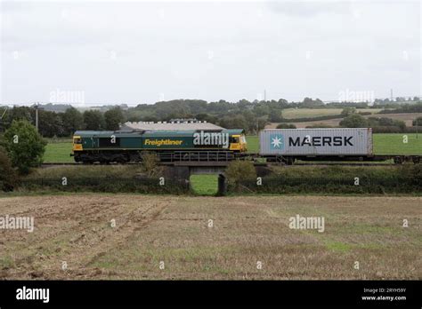 Class 66 Diesel Locomotive No 66547 Pulling A Freightliner Train On