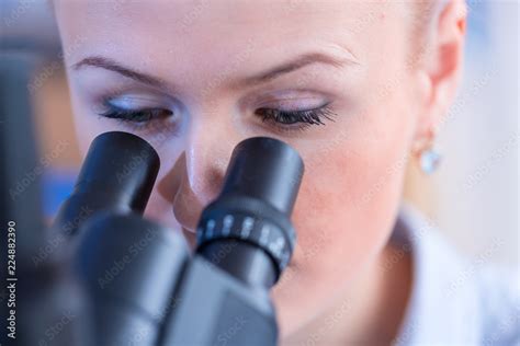 Girl With A Slide For The Microscope University Hospital Attractive Babe Scientist Looking At