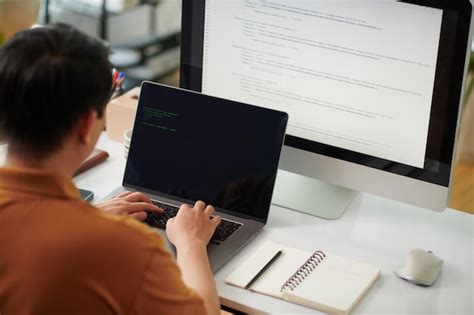 Premium Photo Software Developer Testing Programming Code To Identify
