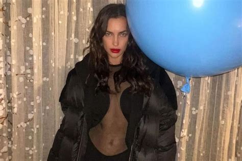 Irina Shayk Wears Sheer Top For Snowy Skating Outing With Friends To