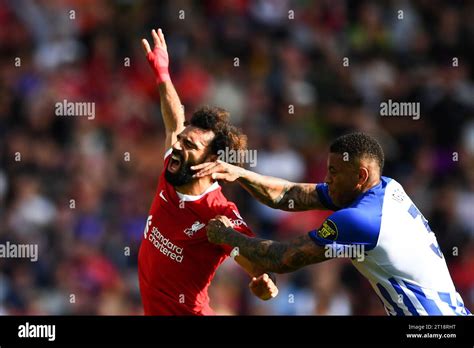 Mohamed Salah Of Liverpool And Igor Julio Of Brighton And Hove Albion