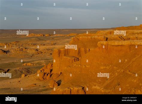 The Orange Rocks Of Bayan Zag Commonly Known As The Flaming Cliffs In Evening Sunshine In The