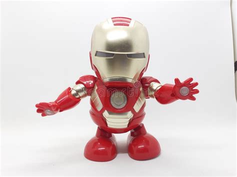 An Anthromorphed Action Figure Of Man Wearing Red And Yellow Power
