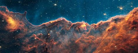 Nasas Webb Space Telescope Pierces Star Forming ‘cosmic Cliffs