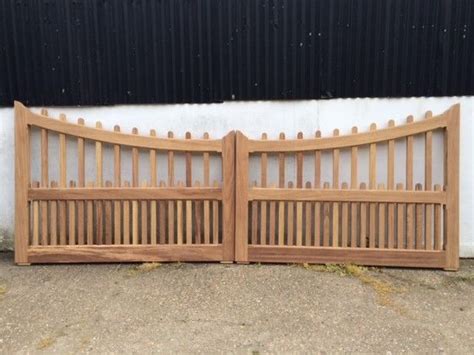 Bespoke Iroko Hardwood Gates With Palisade Top And Bottom
