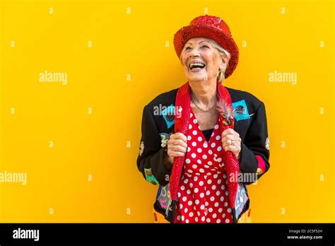Happy And Playful Senior Woman Having Fun Portrait Of A Beautiful