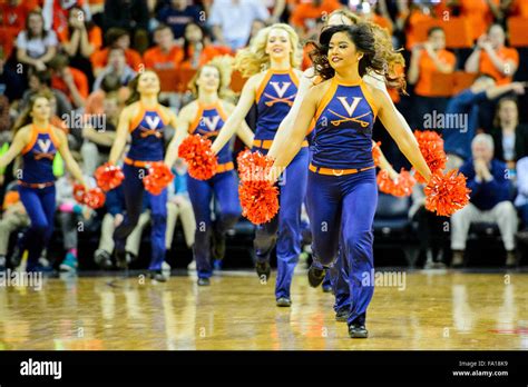 The Virginia Cavaliers Cheerleaders And Dancers During The Ncaa