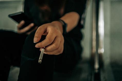Premium Photo Woman Hand Smoking Cigarette Unhealthy Lifestyle Concept