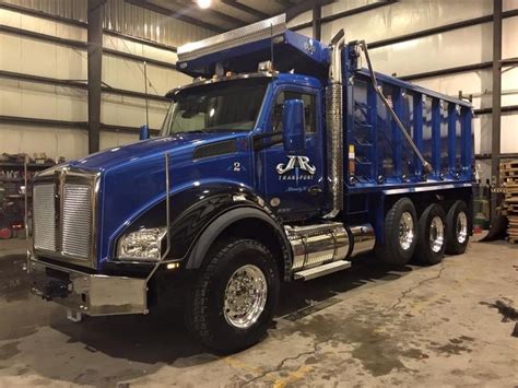 Blue Dump Truck In Garage
