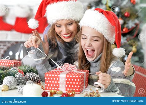 Unwrapping Christmas Present Stock Image Image Of T Mother 80617121