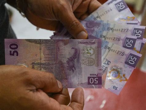 La Jornada El Peso Mexicano Opera Con Volatilidad