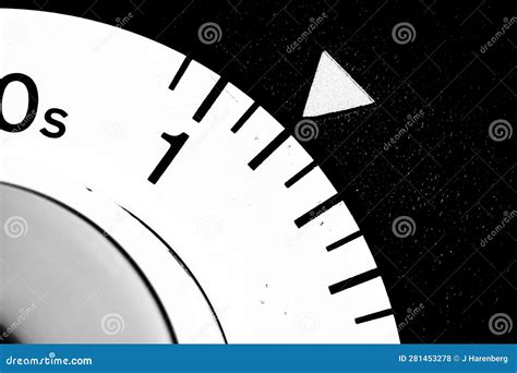 Monochrome Close Up Of An Old Analog Laboratory Timer Set To Two Stock