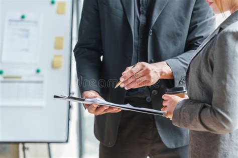 Group Of Business People Meeting For Analysis Data Figures To Plan Business Strategies Business