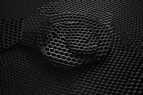 Round Mesh Pattern On Black Background Premium Ai Generated Image