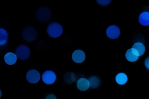 Premium Photo Abstract Blue Lights Bokeh On Dark Background