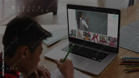 Boy Opening Laptop And Joining Online Coding Lesson While Copying Notes