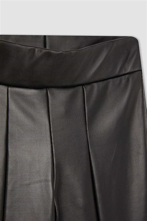 أسود بناتي بنطلون ليجن بناتي جلد صناعي 2994856 Defacto