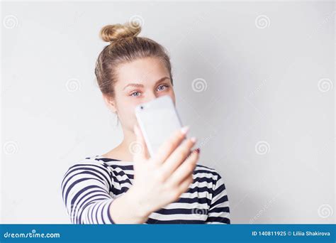 Closeup Portrait Of Beautiful Attractive Smiling Blonde Woman Taking