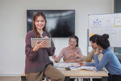 Team Of Ux Developer And Ui Designer Brainstorming Interface Wireframe Design Creative Digital