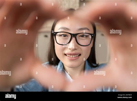 Close Up Photo Portrait Of Young Beautiful Asian Woman Looking At