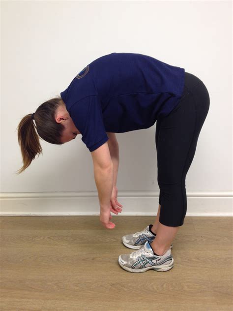 Lumbar Spine Flexion Stretch Standing G4 Physio