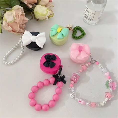 Baseus เคสโทรศพท WM01 TWS เคสปองกนหฟง Baseus WM01พรอมสายคลองตะขอตกแตงนารกอนสตาแกรม