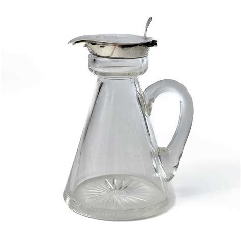 Lot 2 An Edwardian Silver Mounted Glass Whisky