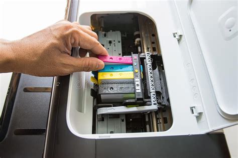 Technicians Are Install Setup The Ink Cartridge Of A Inkjet Printer The