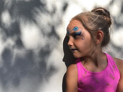 Premium Photo Close Up Of Girl Wearing Face Paint