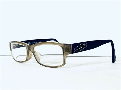 Coach Clear Olive Rectangular Frame And Clear Dark Logo Temple Glasses 52