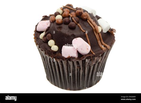 Rocky road muffin- studio shot with a white background Stock Photo - Alamy