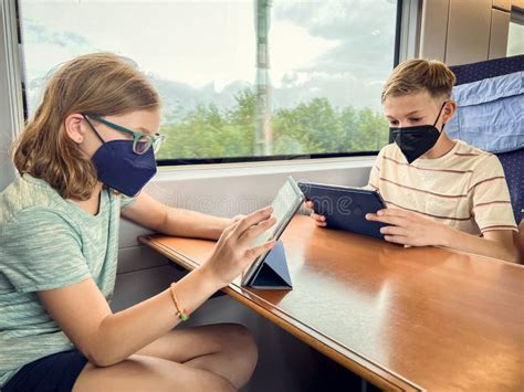 Teen Brother And Sister Travelling On Railway And Play With Their