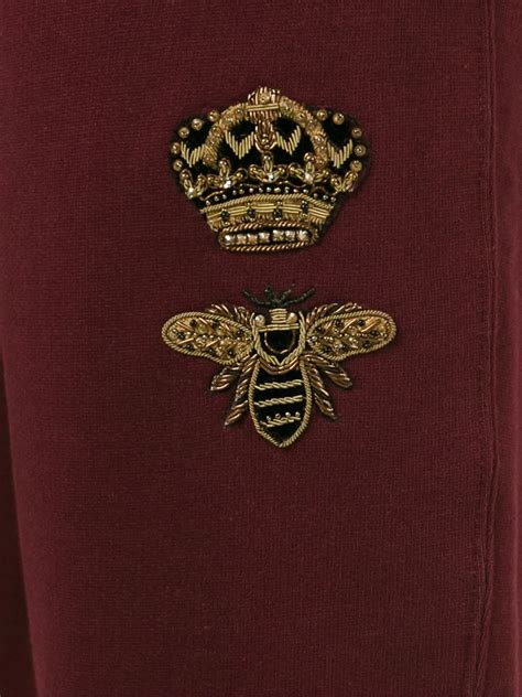 Lyst Dolce And Gabbana Bee And Crown Appliqué Track Pants In Red For Men