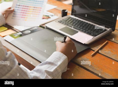 Freelance Artist Graphic Designer Using Digital Tablet Computer Creative Man Working With