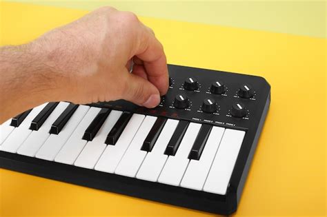 Premium Photo Musical Instrument Hand Control Midi Keyboard