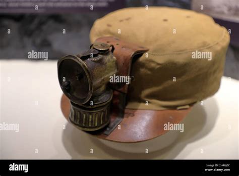 Old Miners Cap With Carbide Headlamp From Early 20th Century Display In Museum Of History And