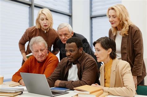 People Learning The Basics Of Computer Technology Stock Image Image