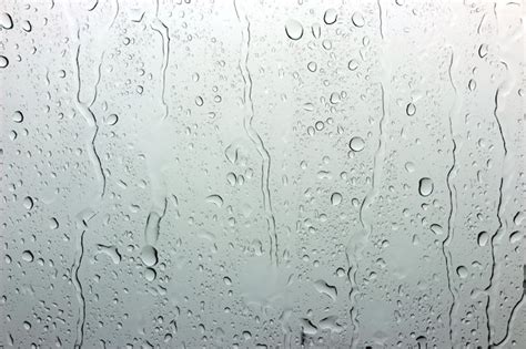 Premium Photo Raindrop On The Glass