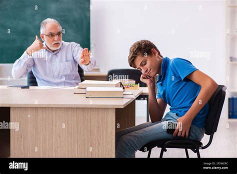 Old Teacher And Schoolboy In The Classroom Stock Photo Alamy