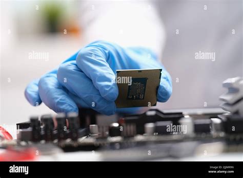 Computer Engineers Hand Is Holding Cpu Processor Stock Photo Alamy