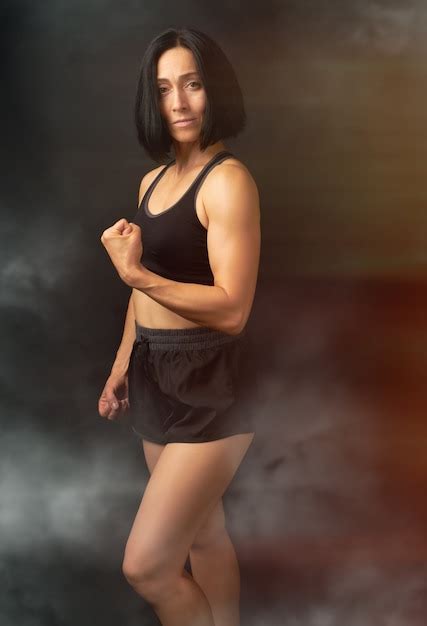Premium Photo Adult Girl With A Sports Figure In Black Bra And Black