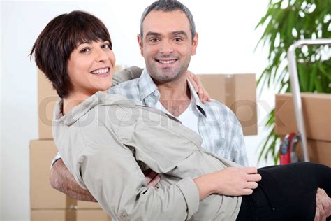 Man Carrying His Wife Over The Threshold Stock Image Colourbox