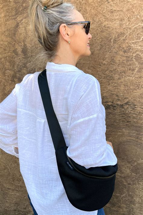 פאוץ׳ שחור פאוץ׳ לנשים פאוץ׳ גדול פאוצים שחורים לנשים עדי בקשי