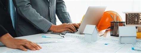 Premium Photo Worker Architect And Engineer Work On Real Estate