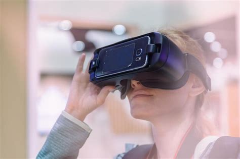 Premium Photo Mid Adult Woman Using Virtual Reality At Home