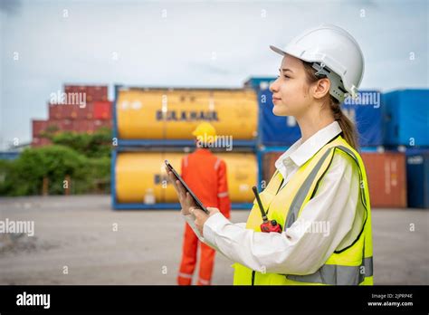 Woman Inspector Manager Checking Cargo In Container Cargo CustomTerminal Port Woman Use Tablet