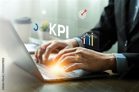 Businessman Analyzing Key Performance Indicators Kpi With Interactive Data Visualization On